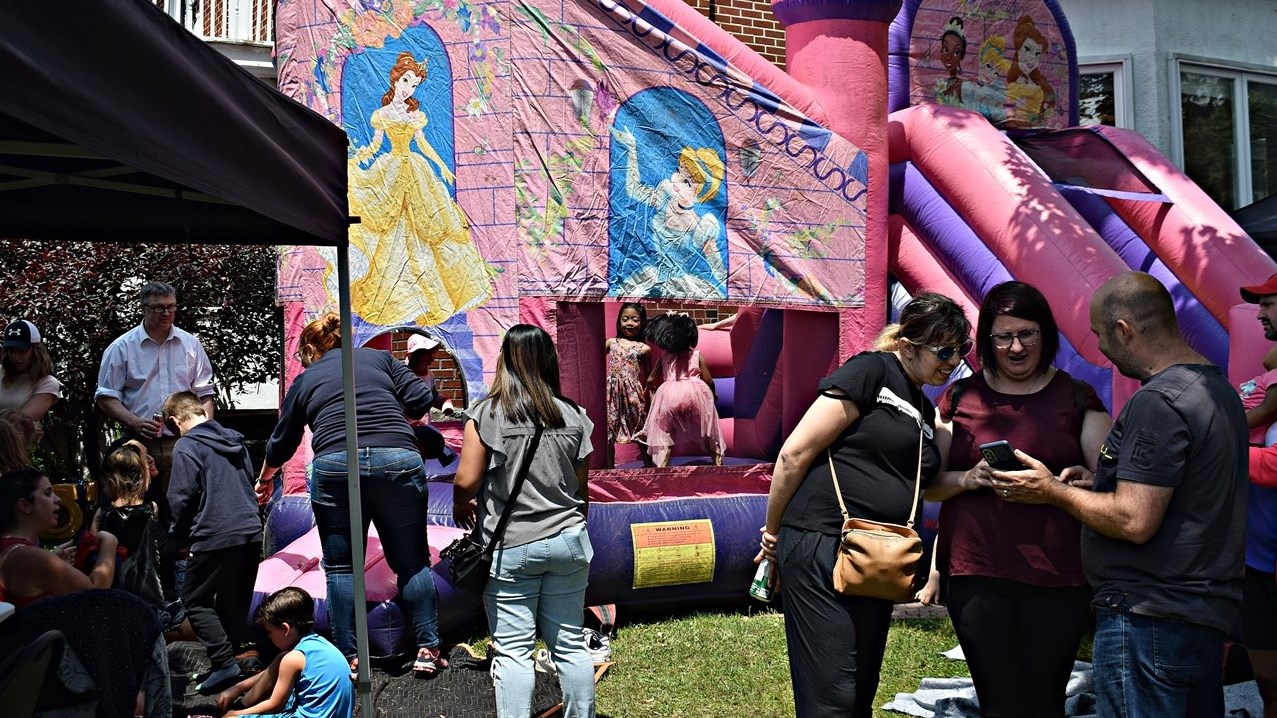 Superhero barbecue draws 400 families to Schiefke's riding office